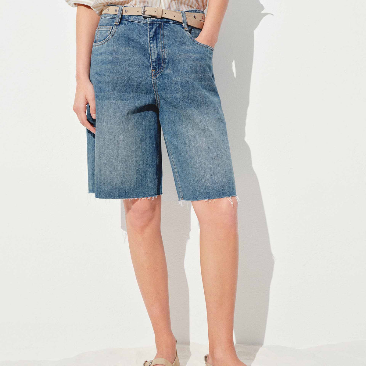 MO&Co. Women's Raw Hem Wash Denim Shorts